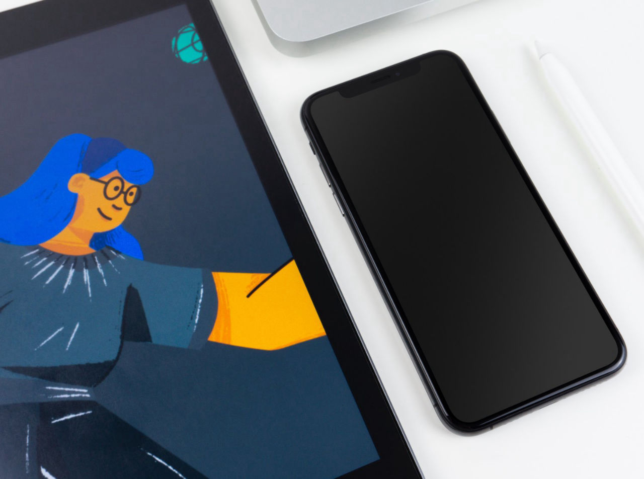 Closeup of iPhone X on desk mockup | MockupsJar